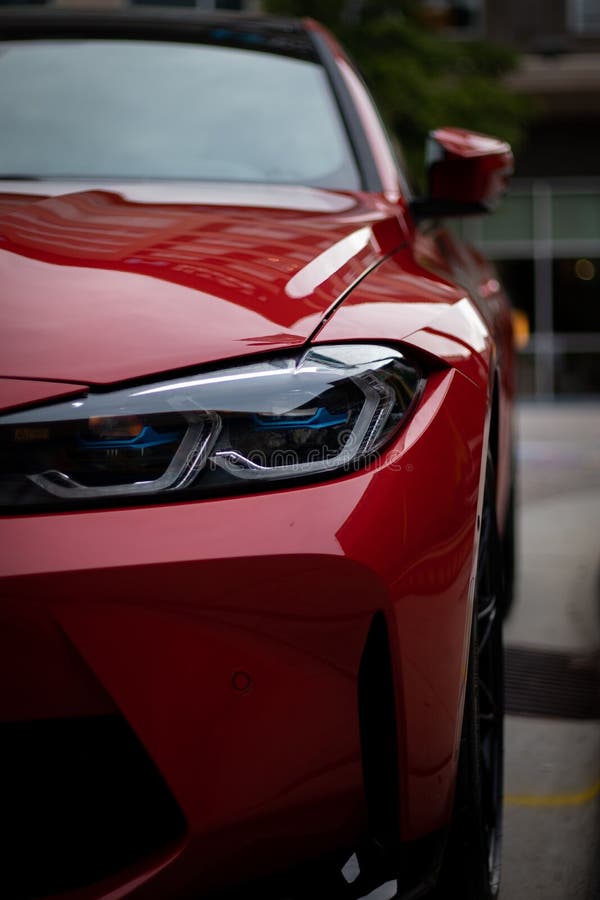 Vertical Closeup of a Red Modern Car Headlights Stock Image - Image of ...