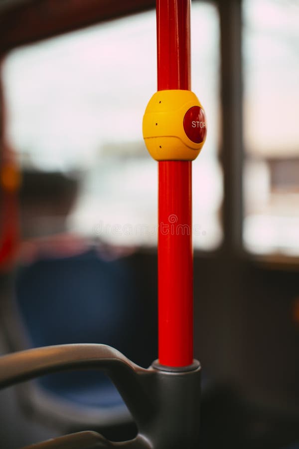 Vertical Closeup Selective Focus Shot of a Bus Interior with Signs and ...