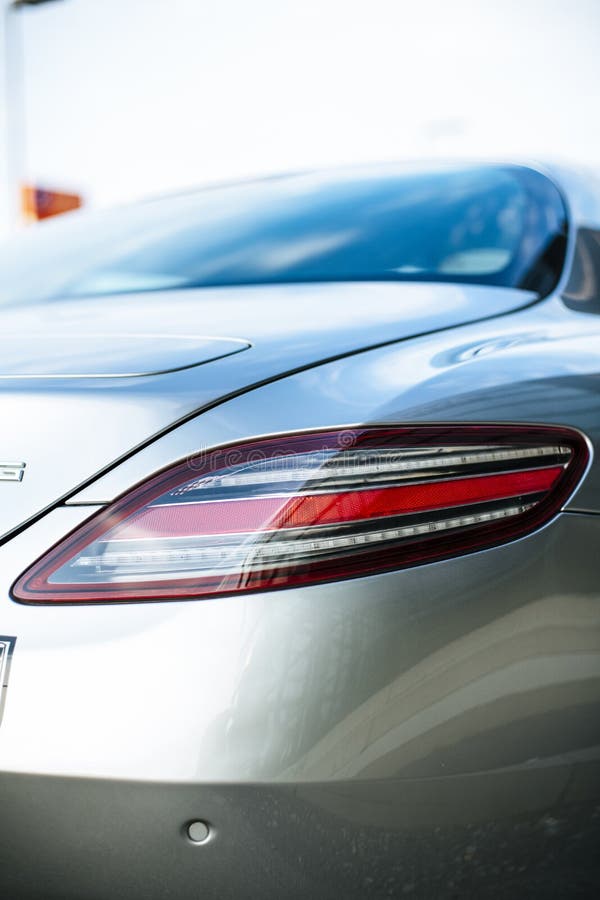 Vertical Closeup Shot of the Back Light of a Modern Silver Car Stock ...