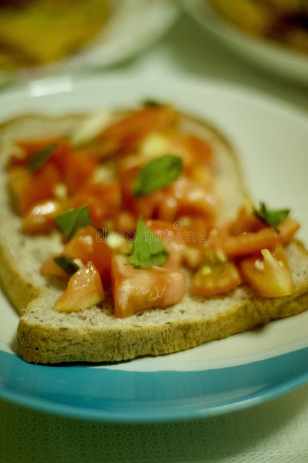 Vertical Closeup Shot of a Bread Slice with Tomatoes Stock Image ...