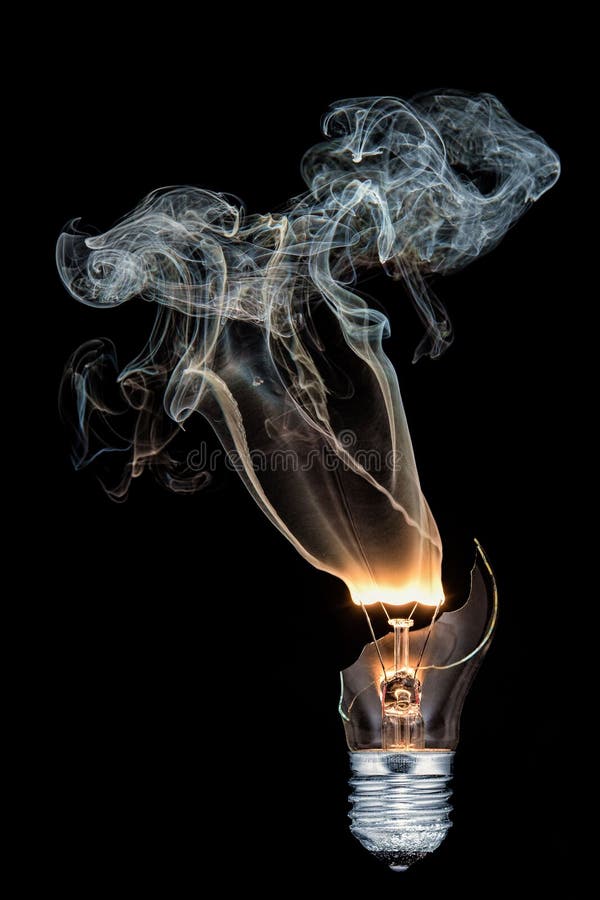 Vertical Closeup Shot of a Burned-out Light Bulb with Smoke Coming Out ...