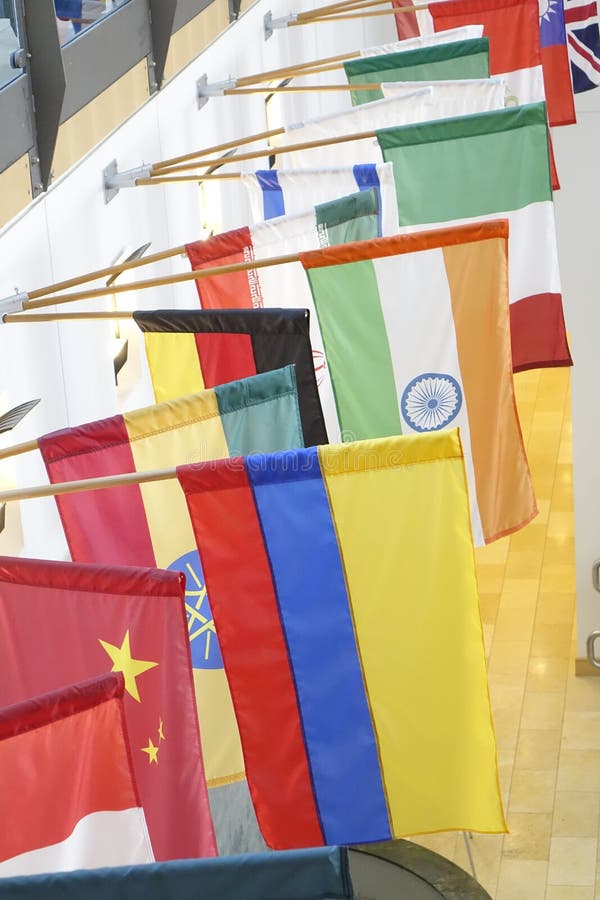 Vertical Closeup Shot of the Flags of Different Countries on Display in ...