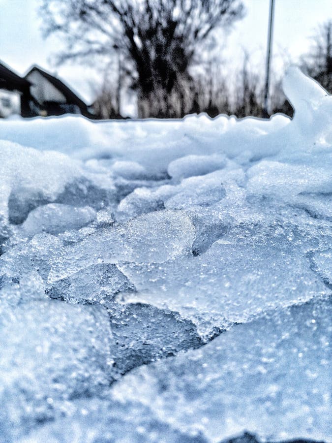 Vertical Closeup Shot of Frozen Ground with Ice and Snow Stock Photo ...