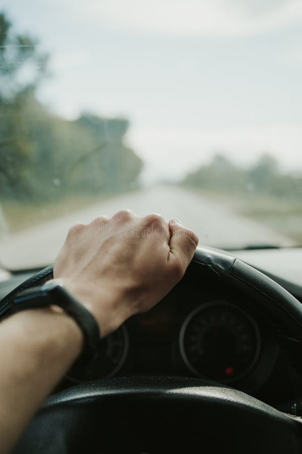 Vertical Closeup Shot of a Hand on a Steering Wheel Stock Image - Image ...