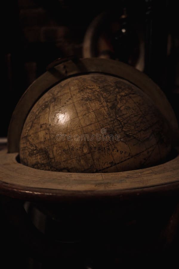 Vertical Closeup Shot of an Old Globe in a Vintage Junkyard. Editorial ... Vertical Closeup Shot of an Old Globe in a Vintage Junkyard. Editorial ...