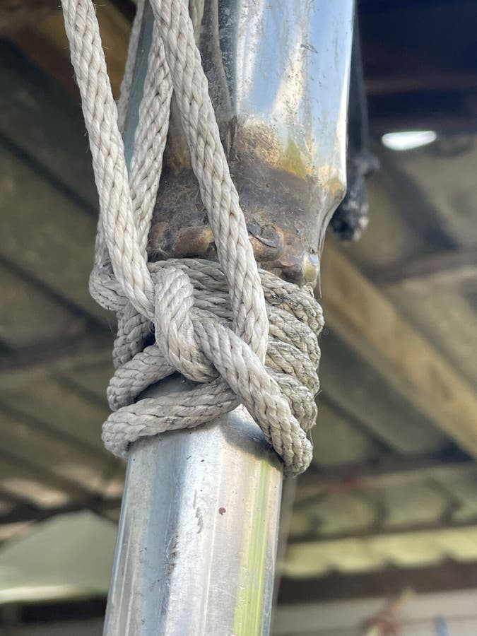 Vertical Closeup Shot of a Rope on a Ship Bridge Stock Image - Image of ...