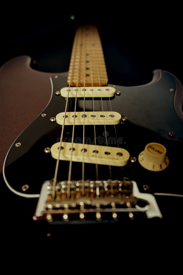 Vertical Closeup Shot of the Strings of an Electric Guitar Stock Photo ...
