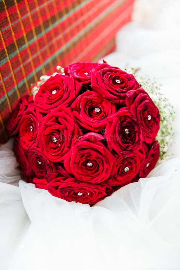 Vertical Closeup Shot of a Wedding Bouquet with Red Roses Stock Photo ...