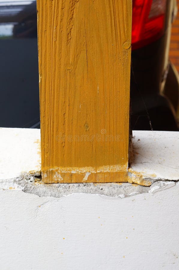 Vertical Closeup Shot of a Wooden Post on the Broken White Ground Stock ...
