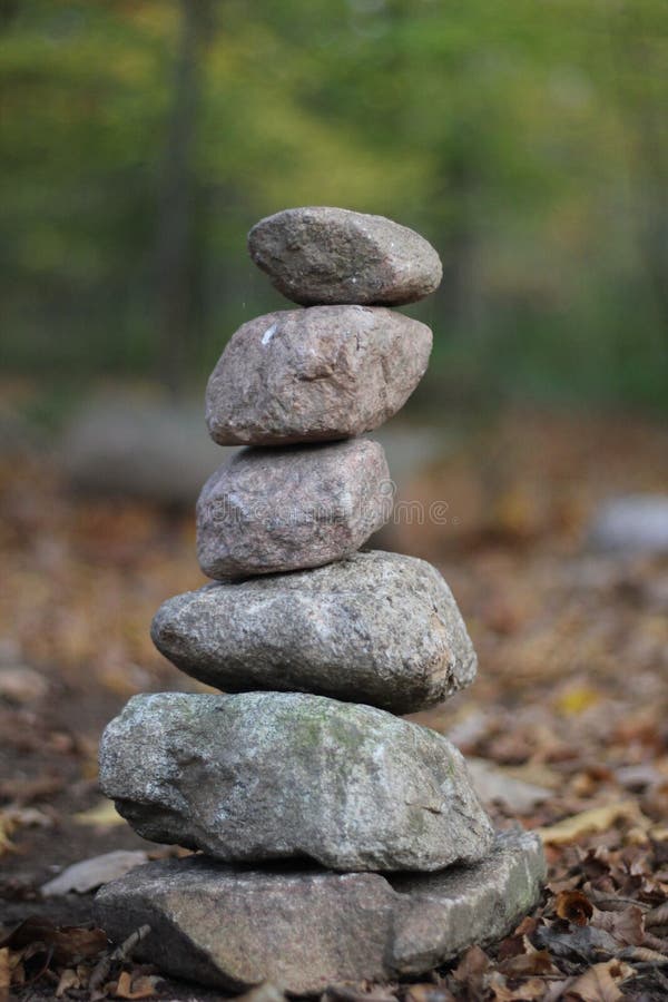 Vertical Closeup of a Stack of Stones, Zen and Balance Practiced ...