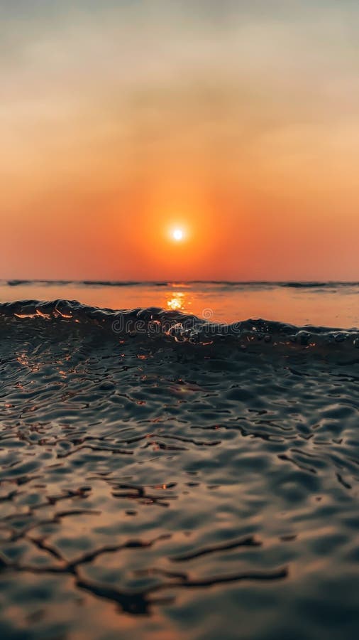 Vertical Closeup of a Sunset Reflection in a Sea Stock Photo - Image of ...