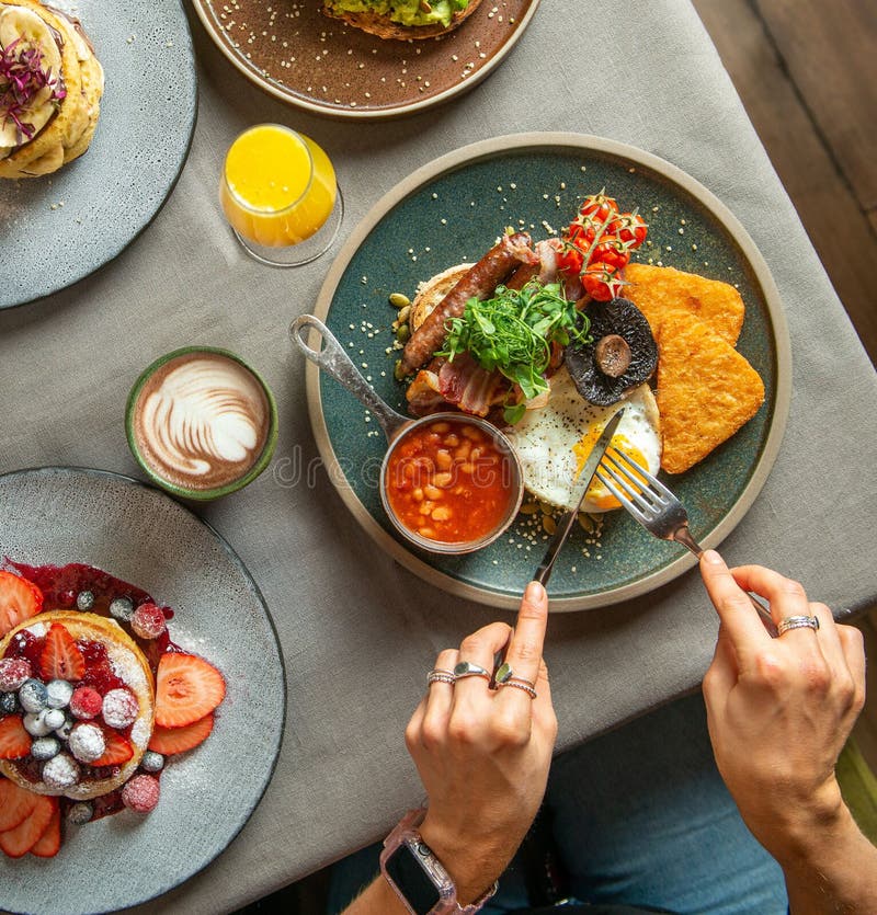 Vertical Closeup of the Table with Various Dishes. Traditional English ...