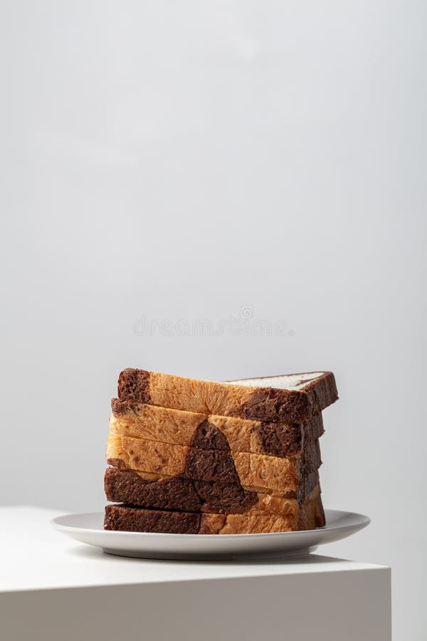 Vertical Closeup of White Bread Slices Mixed with Chocolate on a Plate ...