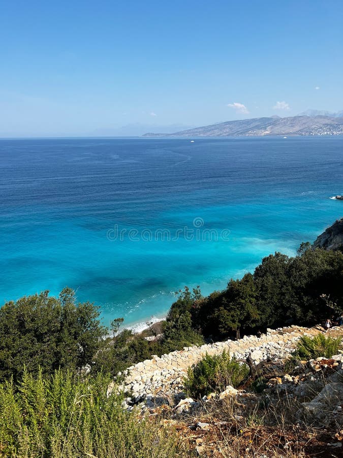 Vertical Coast Side View of the Ocean Under the Blue Sky on a Sunny Day ...