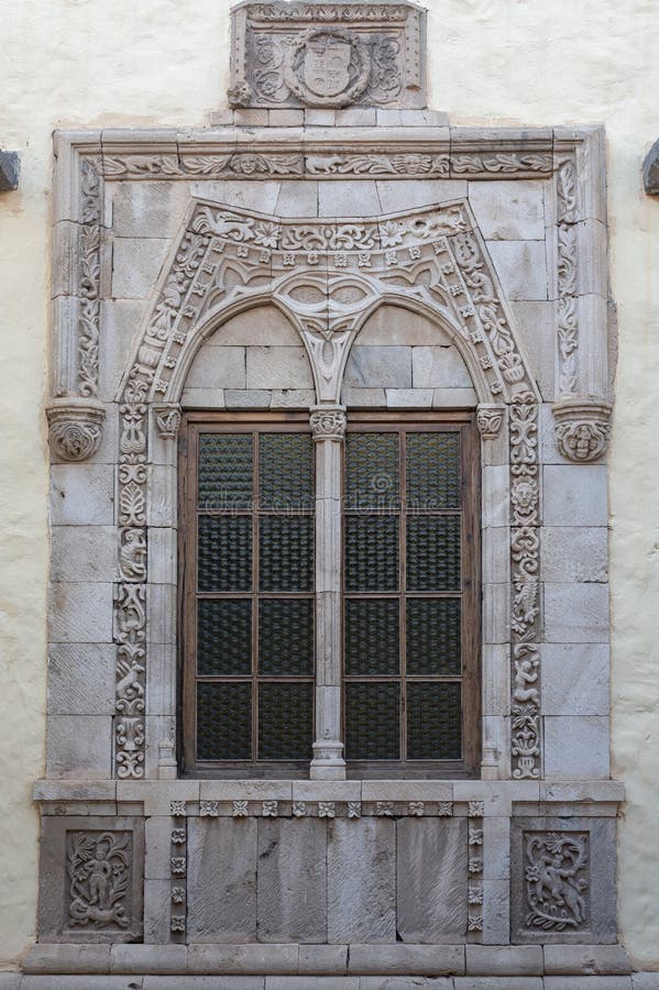 Vertical of a Decorated Old Window of a Stone Facade Stock Image ...