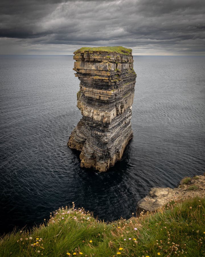 Vertical Drone Shot of the Downpatrick Head on the Coast Under the ...