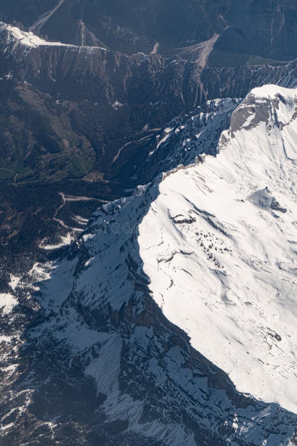 Vertical Eagle-eye Shot of Mountains Covered with Ice and Snow Stock ...