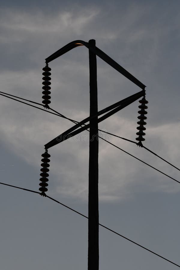 Vertical of an Electrical Tower with Power Lines Running through it ...