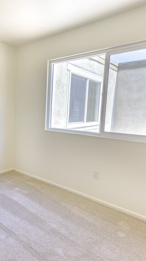 Vertical Empty Bedroom with Carpet and Window Stock Photo - Image of ...