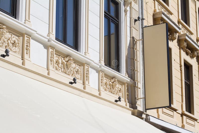 Vertical Empty Signboard on a Building with Classical Architecture ...