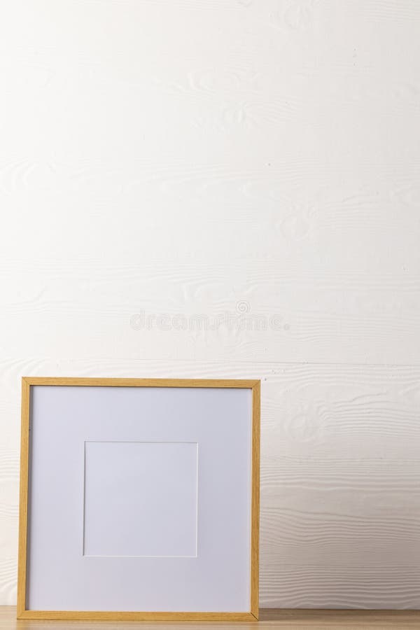 Vertical of Empty Wooden Frame with Copy Space on Table Against White ...