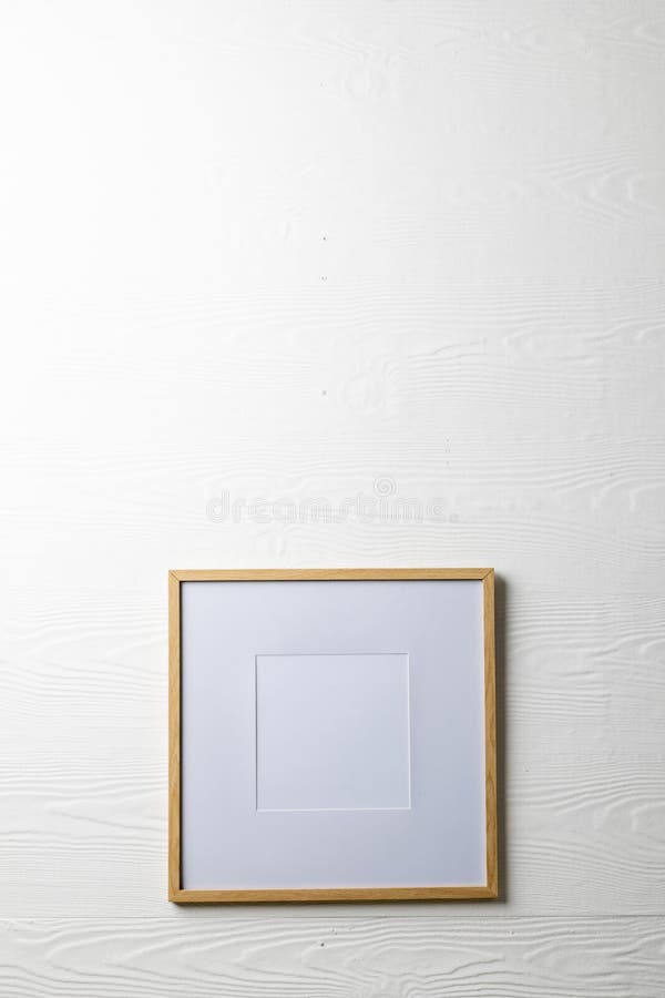 Vertical of Empty Wooden Frame with Copy Space on White Wall Stock ...