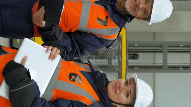 Engineers in Professional Uniform Stand in Storage Terminal Stock Video ...