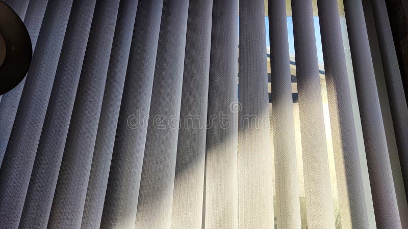 Vertical Fabric White Blinds on the Window with Light and Shadow from ...