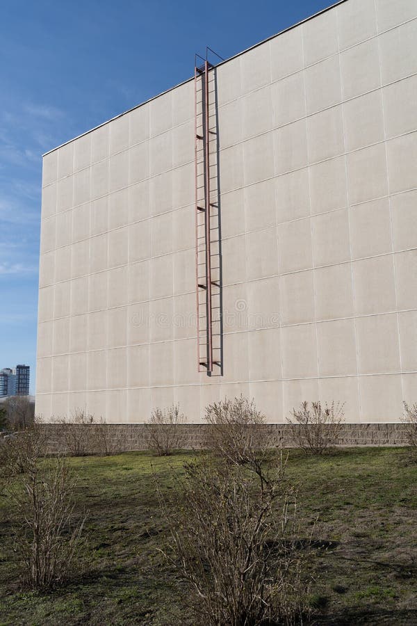 Vertical Fire Escape on the Wall of the Building Stock Photo - Image of ...