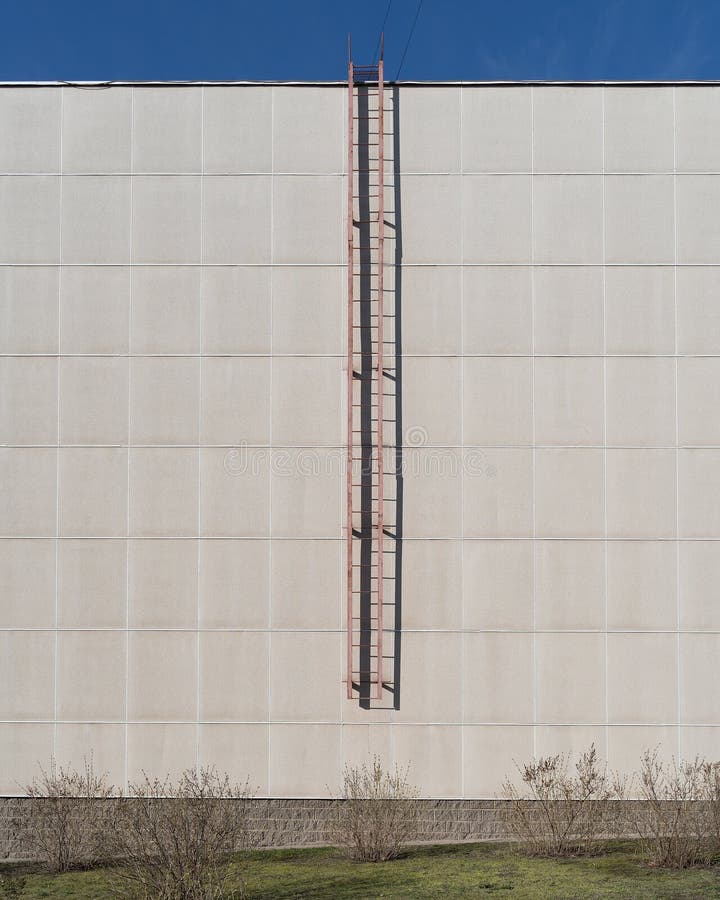 Vertical Fire Escape on the Wall of the Building Stock Photo - Image of ...