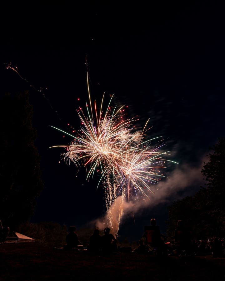 Vertical Firework Undershot Bursting Sparks in the Night Sky Stock ...