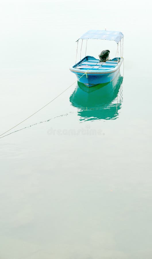Vertical fishing boat stock photo. Image of parked, water - 57784834