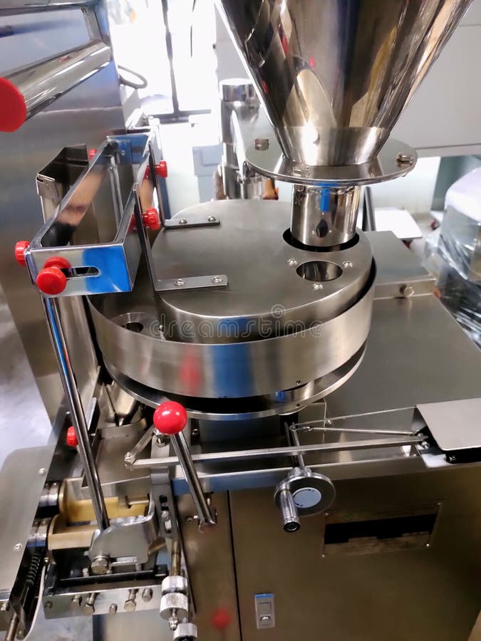 Vertical Form Fill Seal Machine Stock Photo - Image of machine ...