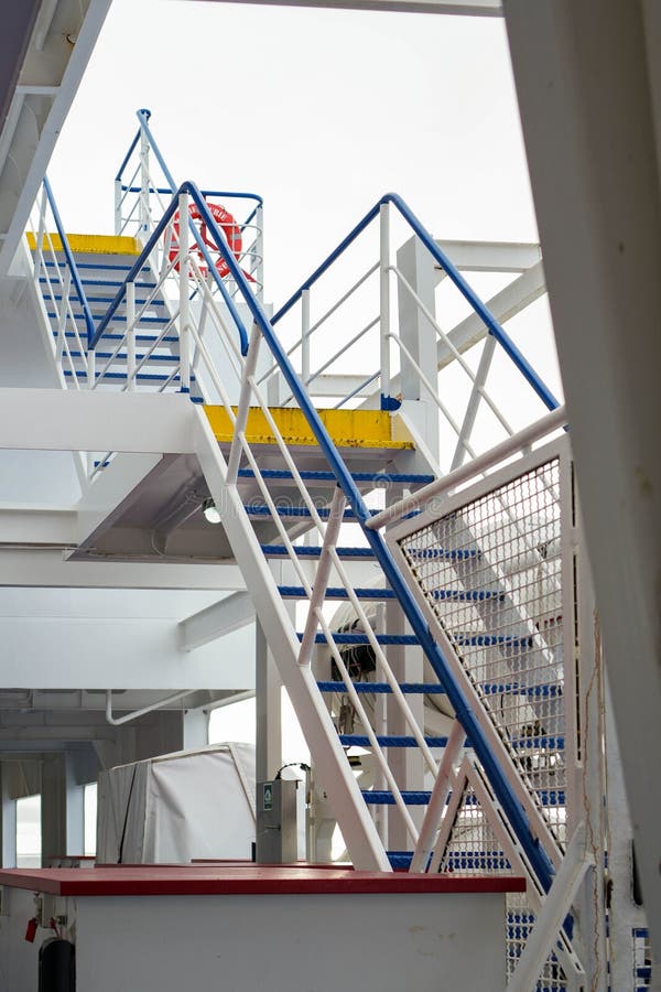 Vertical Frame of a Complex Blue and White Industrial Staircase ...