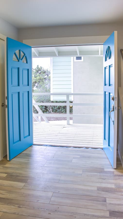 Vertical Frame Wide Open Front Doors with Townhome Stock Image - Image ...