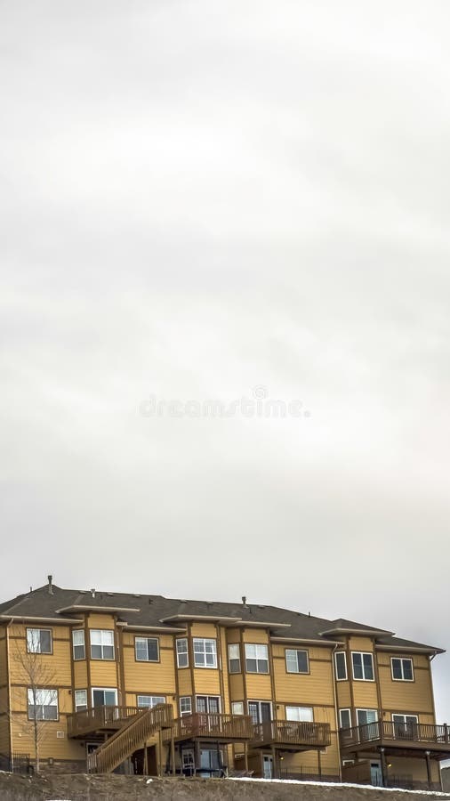 Vertical Frame Homes with Balconies and Half Hexagon Shaped Windows ...