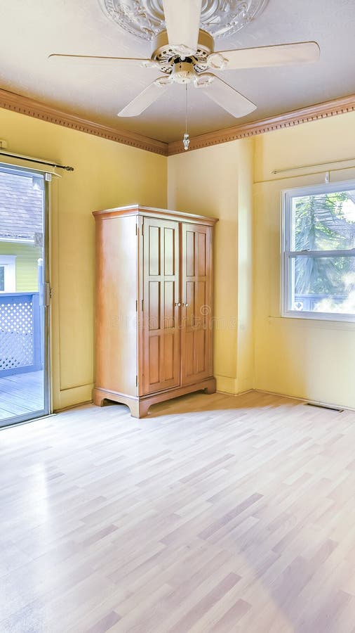 Vertical Frame Interior of Empty Master Bedroom in Bright Sunny San ...