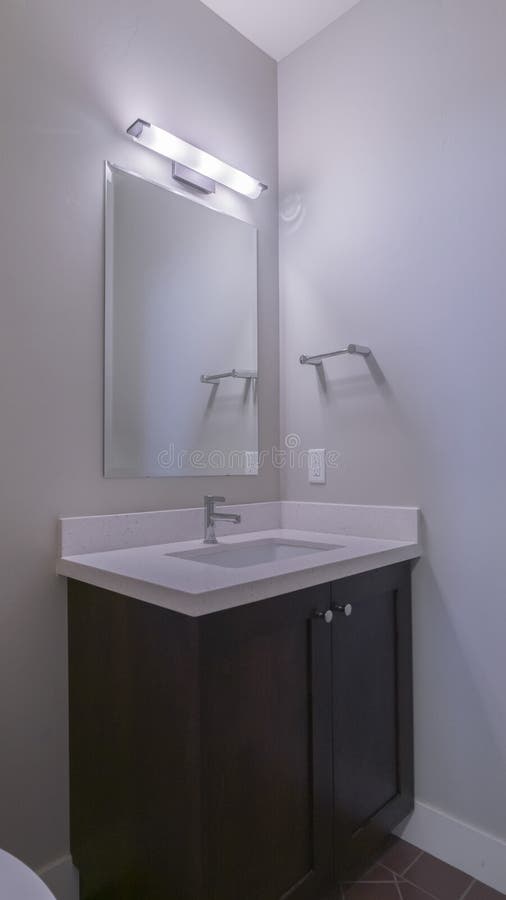 Vertical Frame Small Hand Basin and Mirror in a Toilet Stock Photo ...