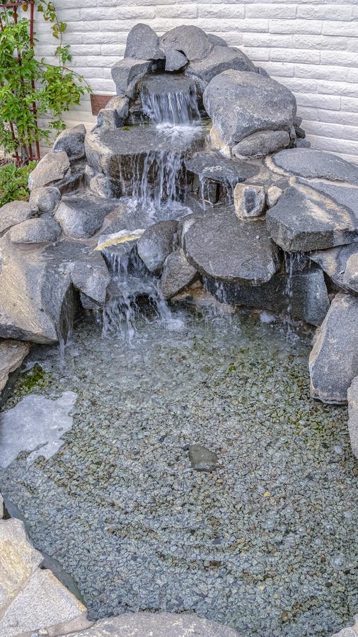 Vertical Frame Cascade Waterfall Landscape Decoration on a Sunny Day ...