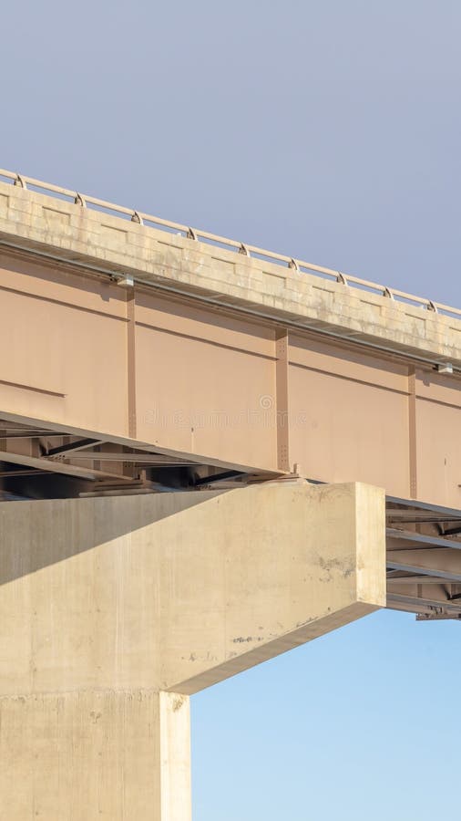View Beneath a Stringer Bridge with Massive Abutment that Supports the ...