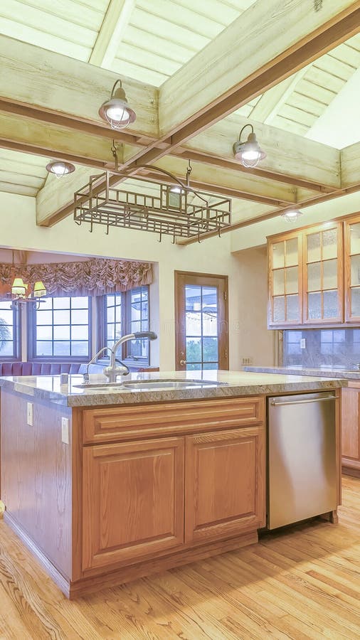 Vertical Frame Well Lit, Open and Warm Kitchen with Vaulted Ceilings ...