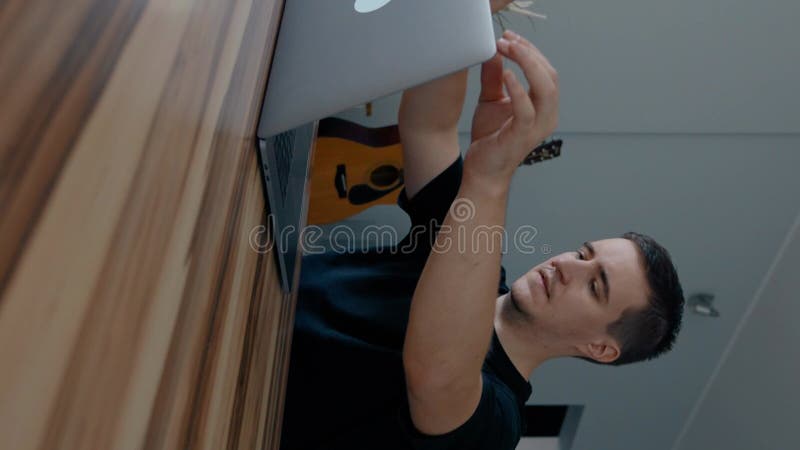 Vertical of Freelancer Opens Laptop To Continue Writing Article at ...