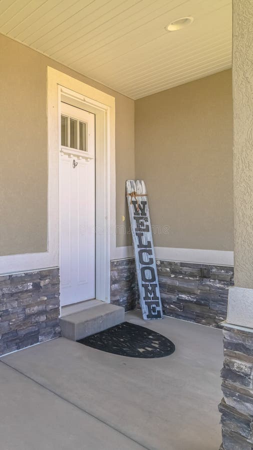 Vertical Front Veranda of Modern Home with Welcome Sign Stock Photo ...