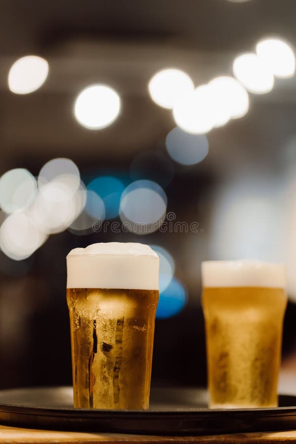 Vertical of a Glass Filled with Golden-colored Beer Stock Image - Image ...