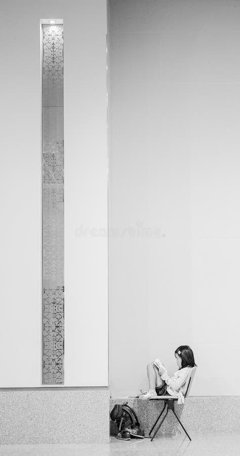 Vertical Gray Scale Shot of a Child Reading a Book Stock Photo - Image ...