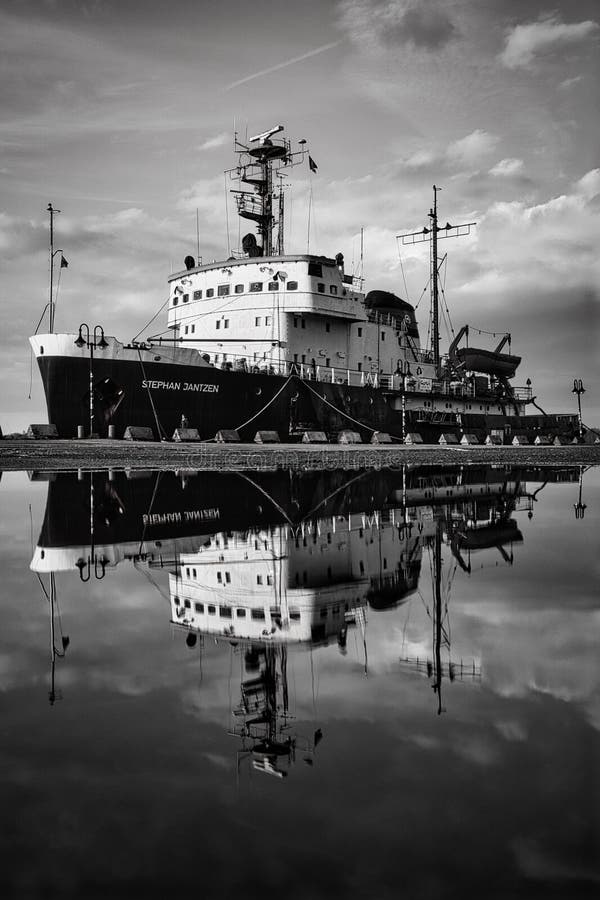 Vertical Grayscale of an Icebreaker Ship Symmetrically Reflecting on ...