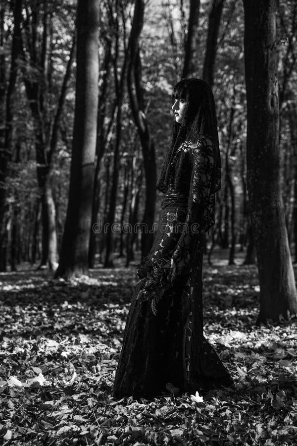 Vertical Grayscale of a Scary Corpse Bride in the Autumn Forest Stock ...