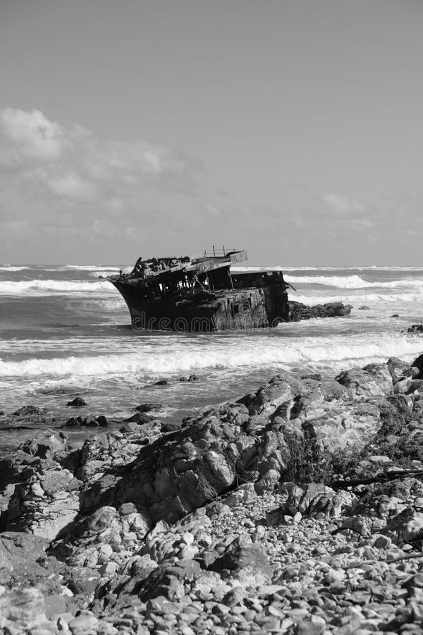 Vertical Grayscale of a Shipwreck in Seascape Coastline Hulk of a Cargo ...