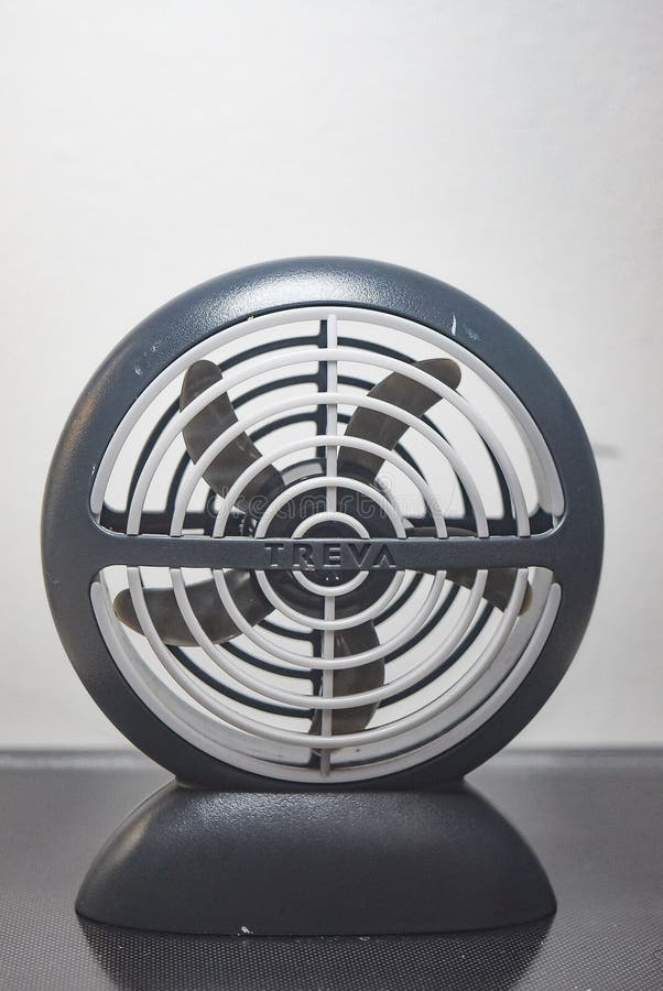 Vertical Grayscale Shot of Large Round Fan with His Stand Stock Image ...