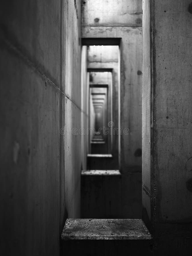 Vertical Grayscale Shot of the Sequence Ofrectangular Holes Inside Each ...